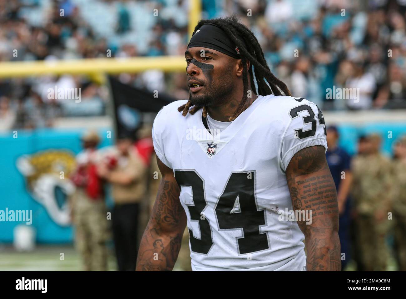 Las Vegas Raiders running back Brandon Bolden (34) walks the sideline ...