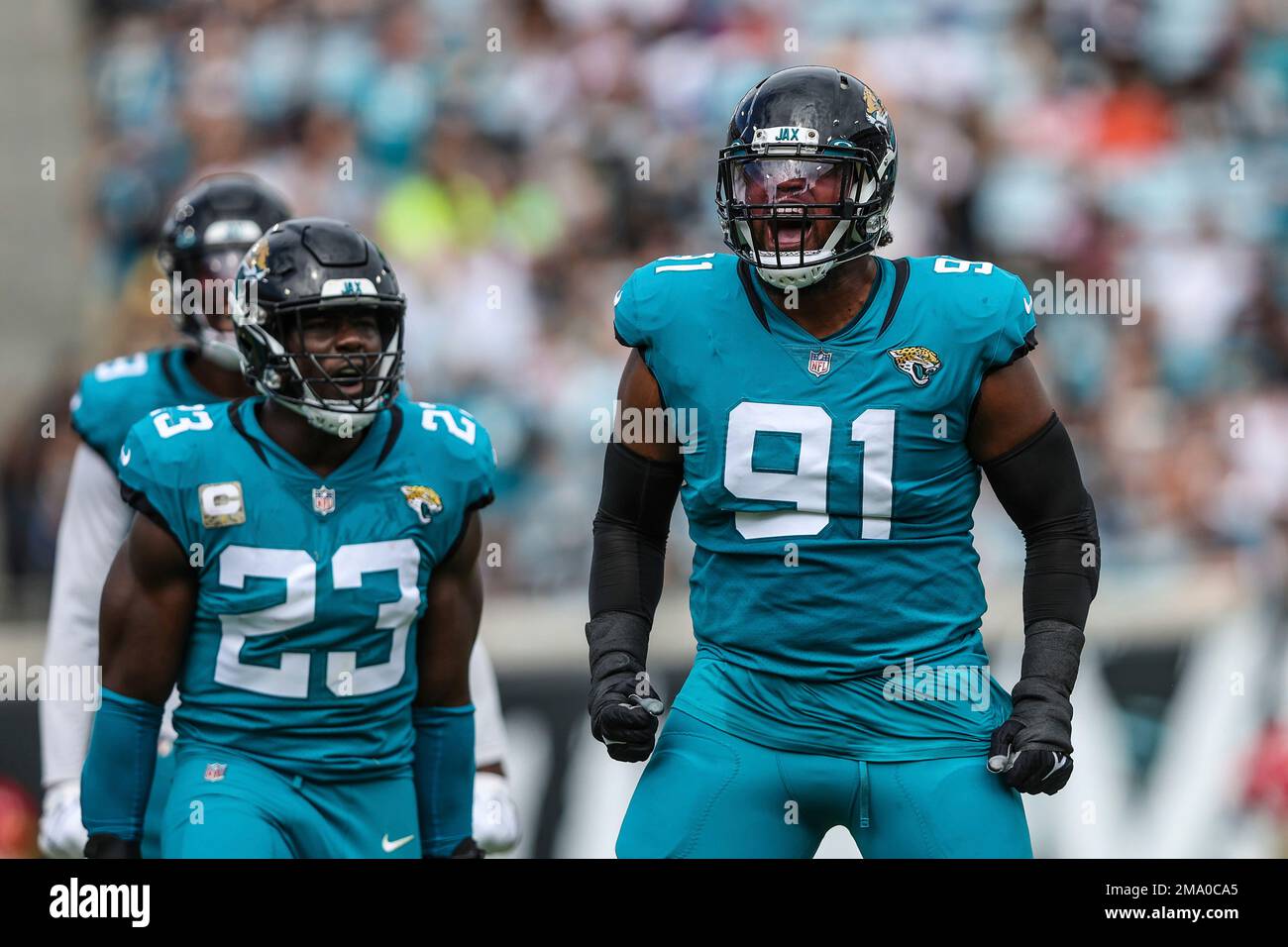 Jacksonville Jaguars defensive end Dawuane Smoot (91), right ...