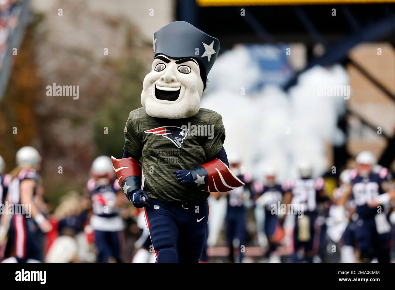 The New England Patriots mascot before an NFL football game against the ...
