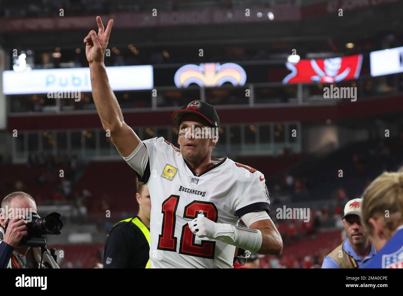 Tampa Bay Buccaneers quarterback Tom Brady (12) waves to spectators ...