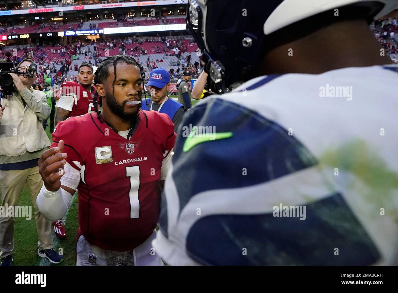 Arizona Cardinals quarterback Kyler Murray (1) greets Seattle Seahawks ...