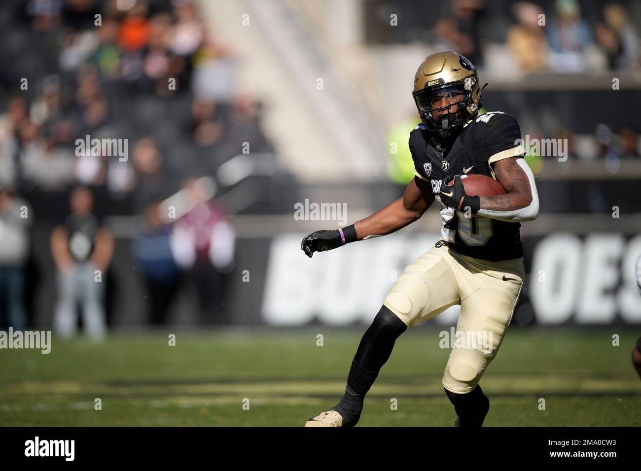 Colorado running back Deion Smith (20) in the first half of an NCAA ...