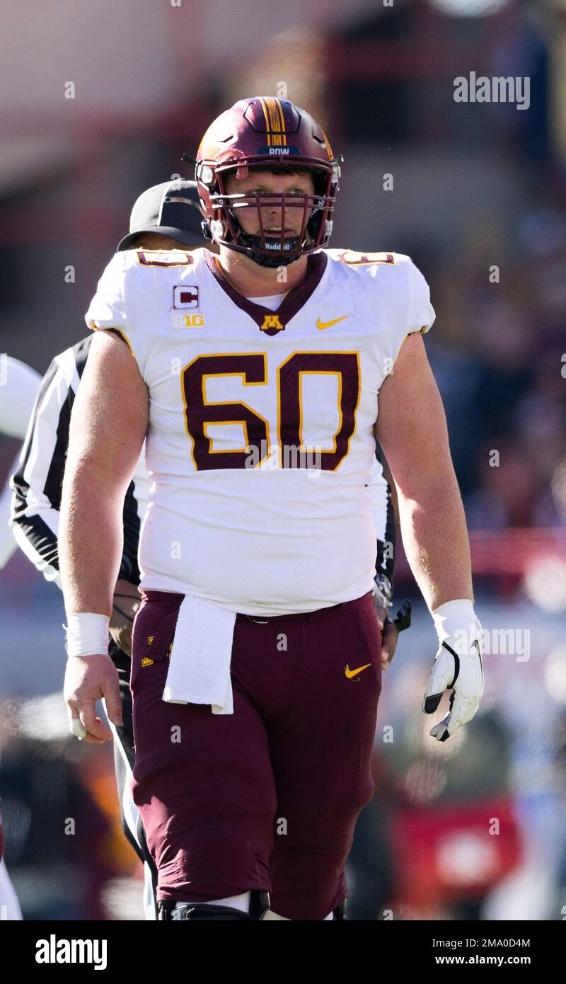 Minnesota offensive lineman John Michael Schmitz (60) waits for the ...