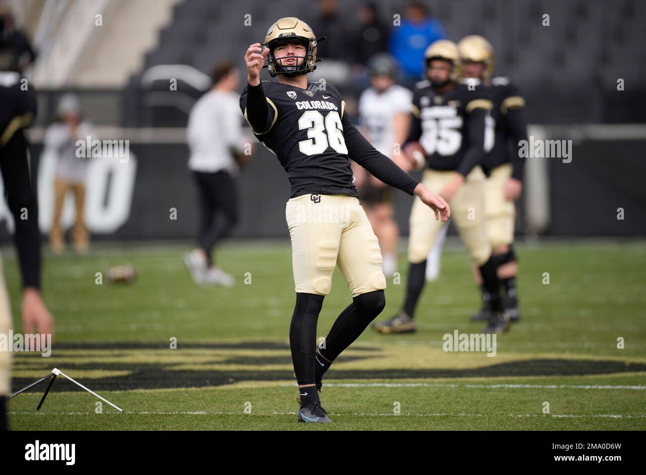 Colorado place kicker Cole Becker (36) warms up before an NCAA college ...