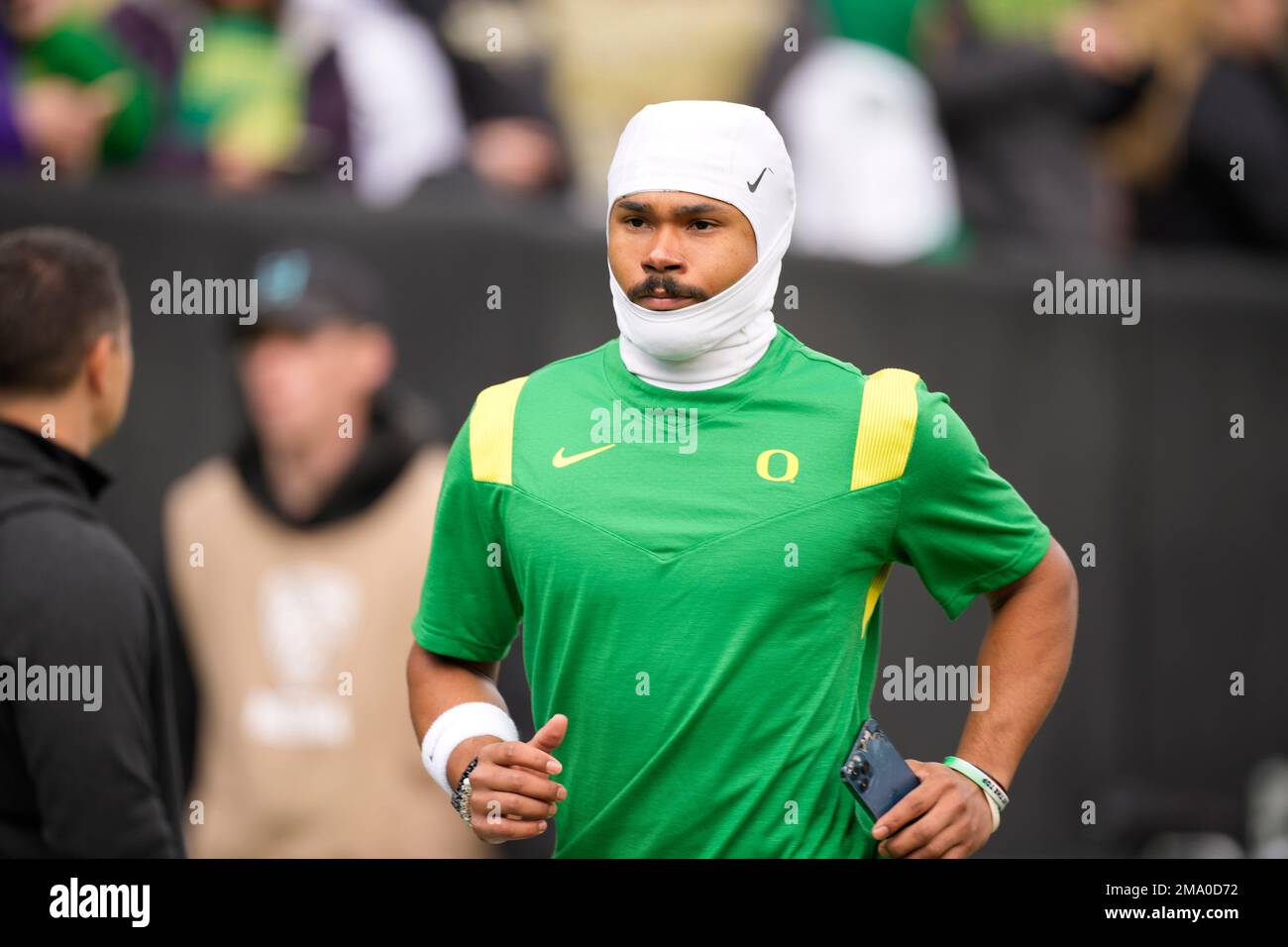 Oregon wide receiver Josh Delgado (83) warms up before an NCAA college ...