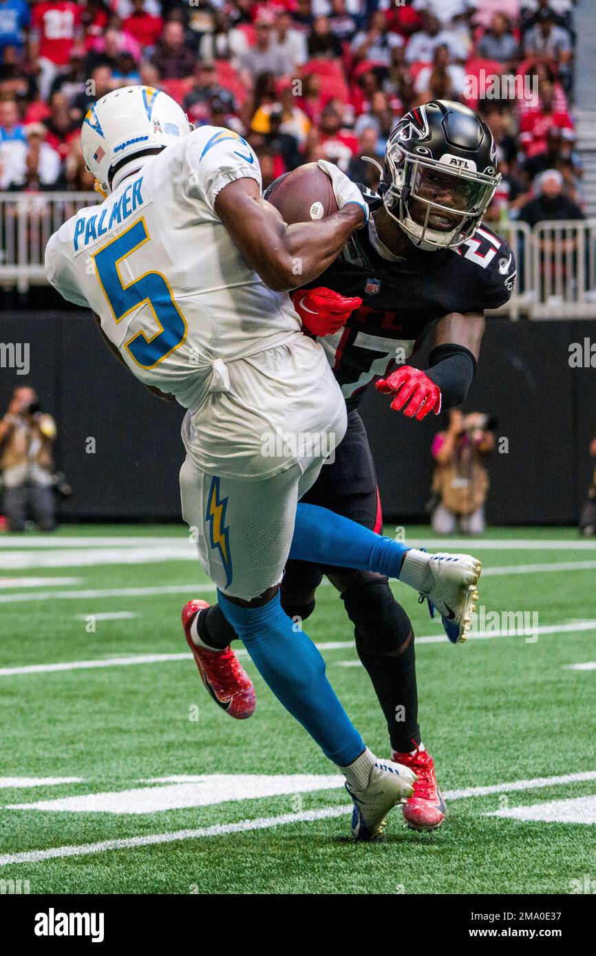Atlanta Falcons safety Richie Grant (27) tackles Los Angeles Chargers ...