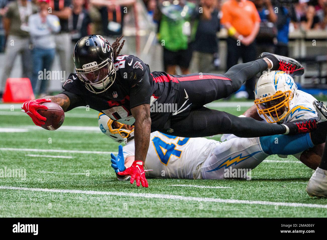 Atlanta Falcons running back Cordarrelle Patterson (84) dives into the ...