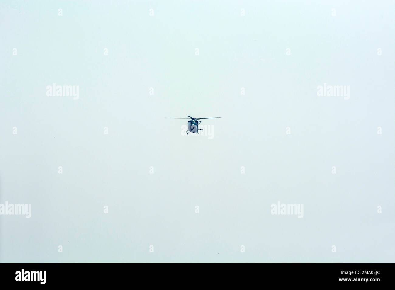 Three military helicopters flying on sky in formation - Military ...