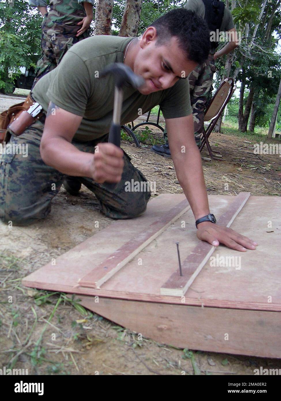 040512-M-4688C-003. US Marine Corps (USMC) Lance Corporal (LCPL) George ...