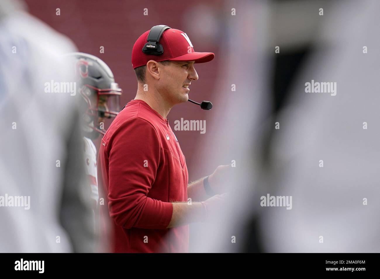 Washington State head coach Jake Dickert watches during the first half ...