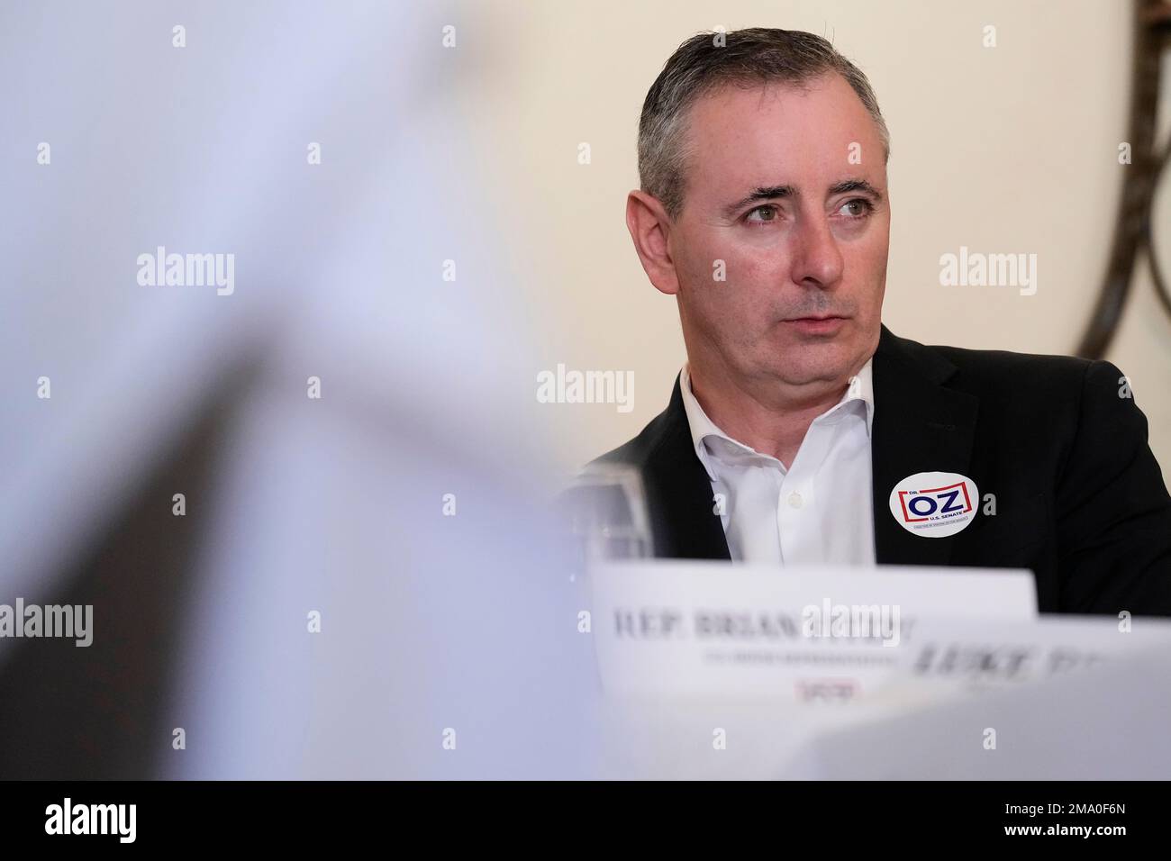 Rep. Brian Fitzpatrick, R-Pa., listens during a campaign event for ... Rep. Brian Fitzpatrick, R-Pa., listens during a campaign event for ...