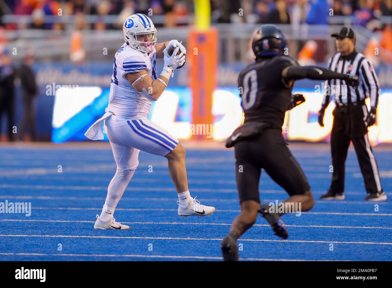 BYU fullback Masen Wake (13) turns up field after a receptions against ...