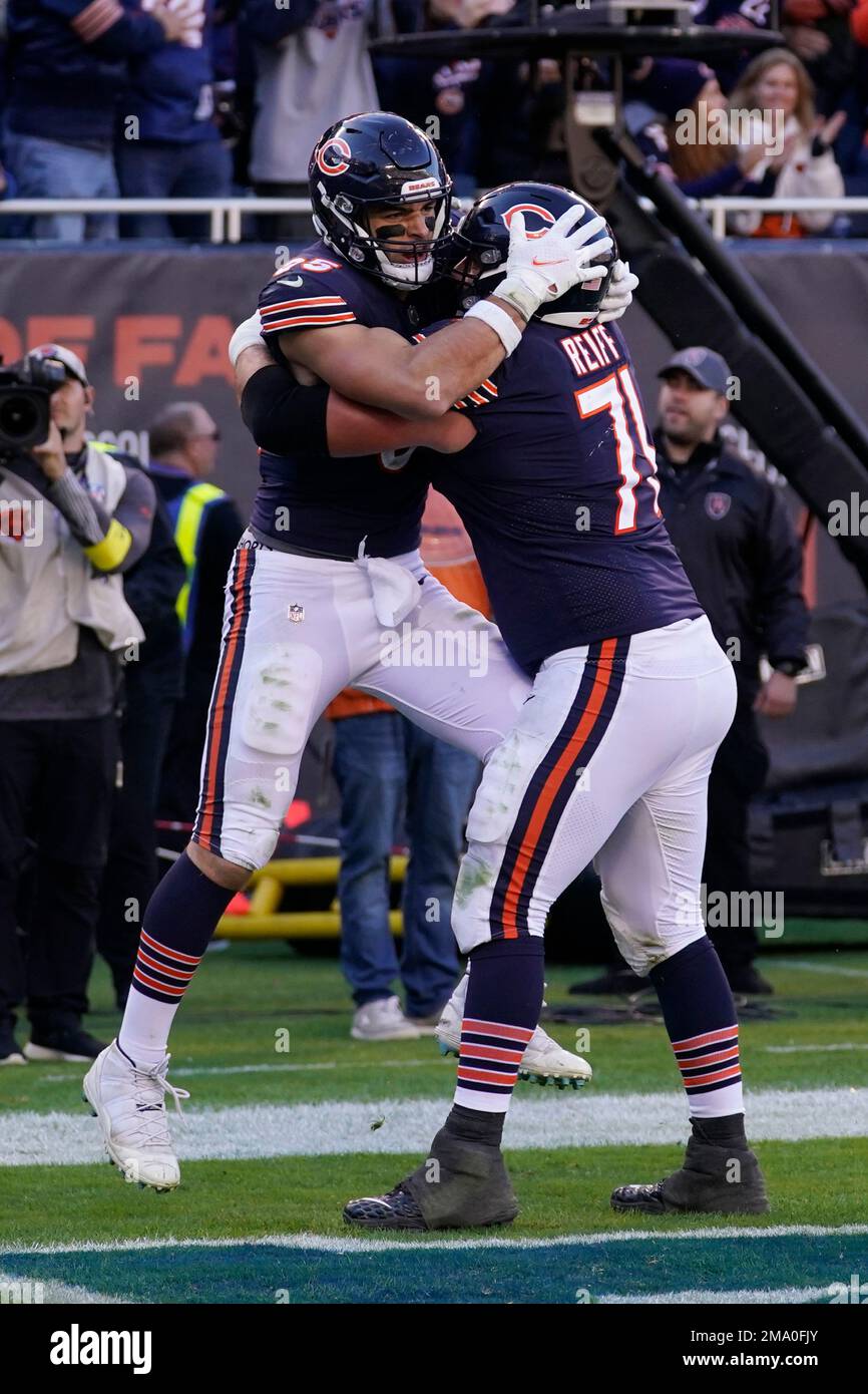 Chicago Bears tight end Cole Kmet, left, celebrates his touch down with ...