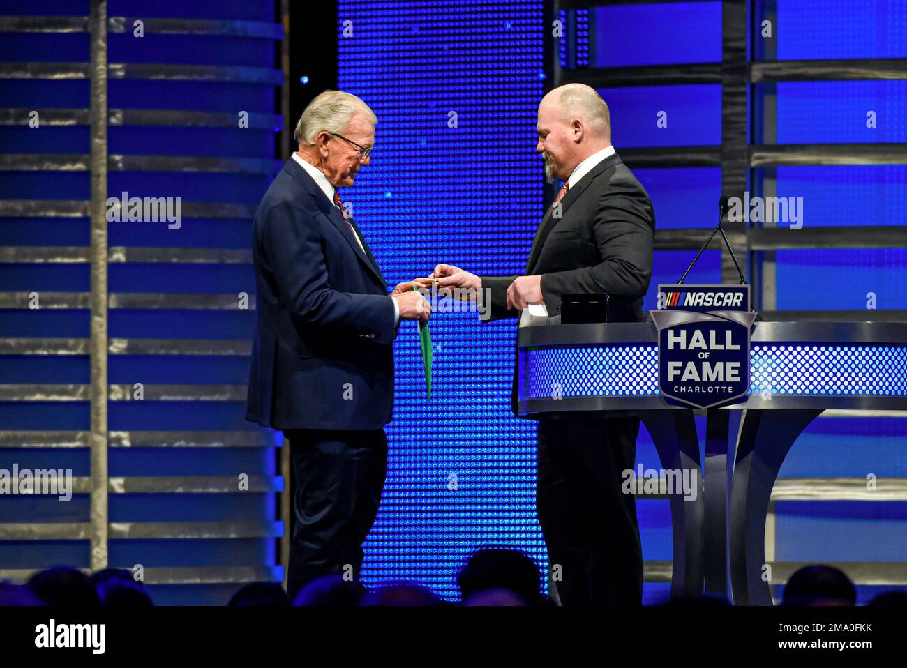 FILE - Coy Gibbs, right, presents the Hall of Fame ring to his father ...