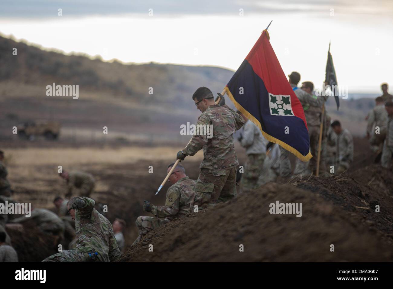 An Ivy Soldier descends into an anti-tank ditch while holding the 4th ...