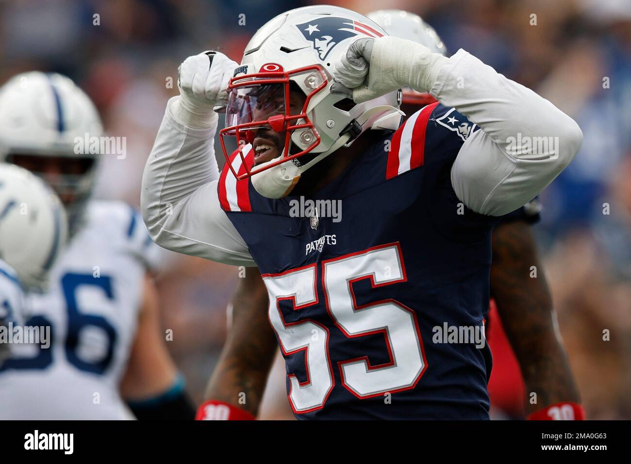 New England Patriots linebacker Josh Uche (55) celebrates after sacking ...