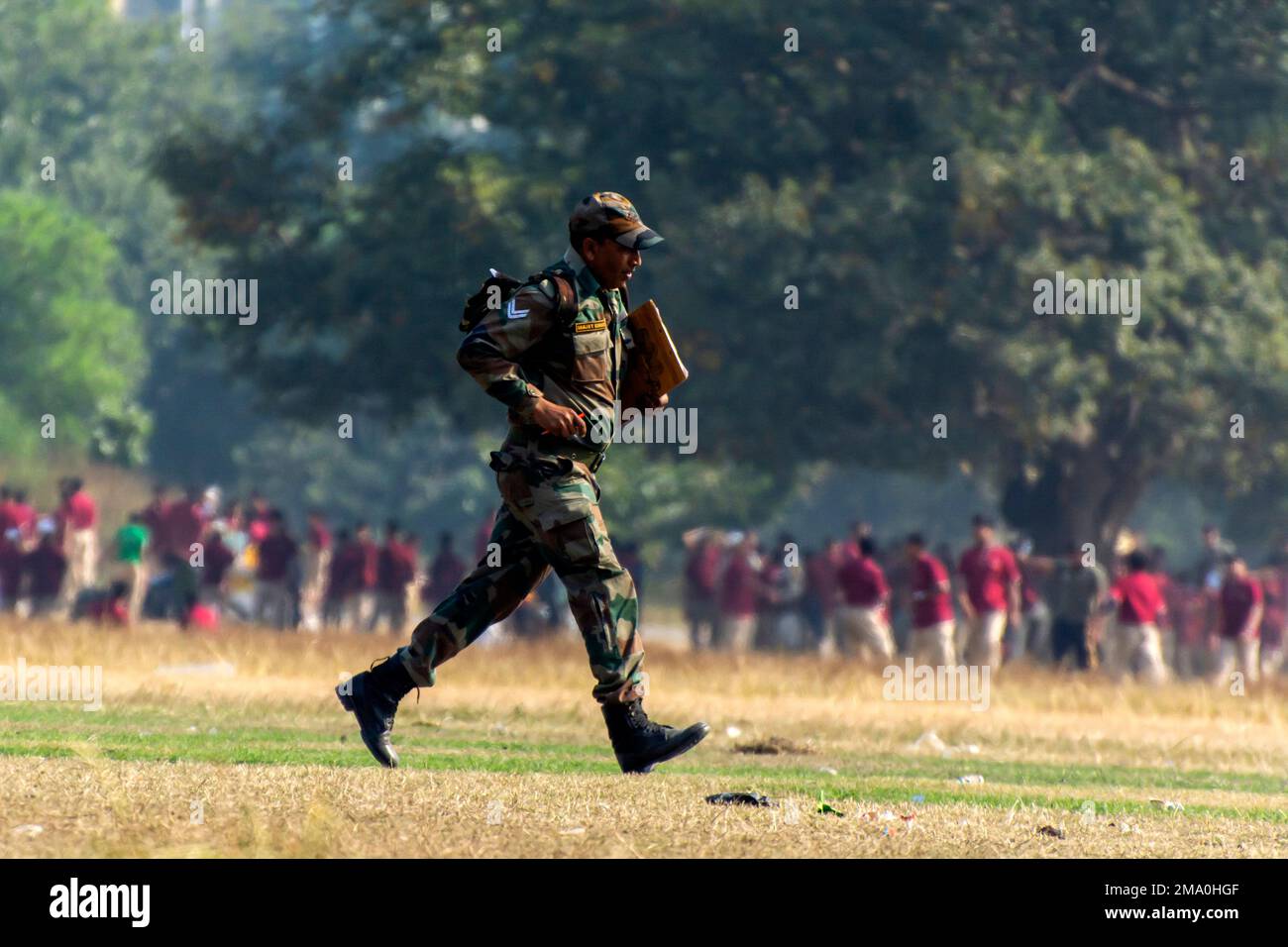 Kolkata, India 15th December 2022. A soldier is running with a file ...