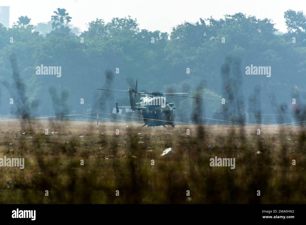 Military helicopter is ready to fly on a ground in a city Stock Photo ...