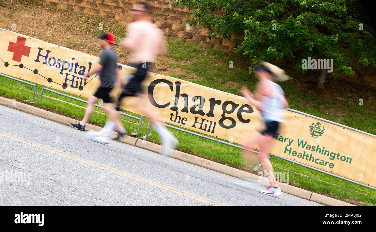 Runners make their way up Hospital Hill as they participate in the ...