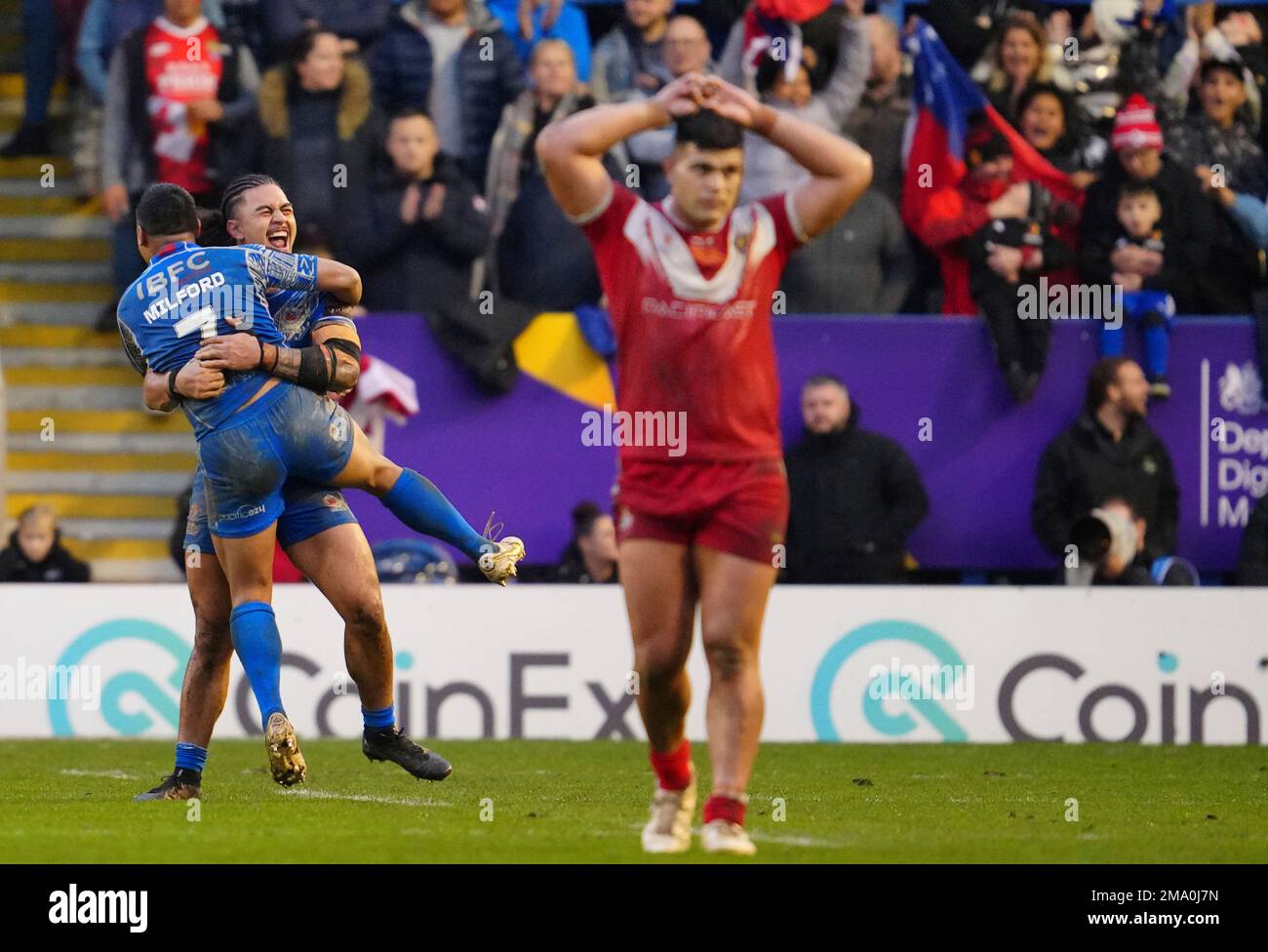 Samoa's players celebrate at the end of the Rugby League World Cup ...