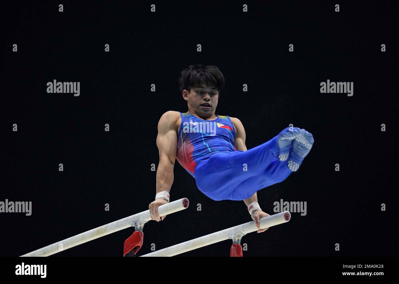 Carlos Edriel Yulo of the Philippines competes in the parallel bars ...
