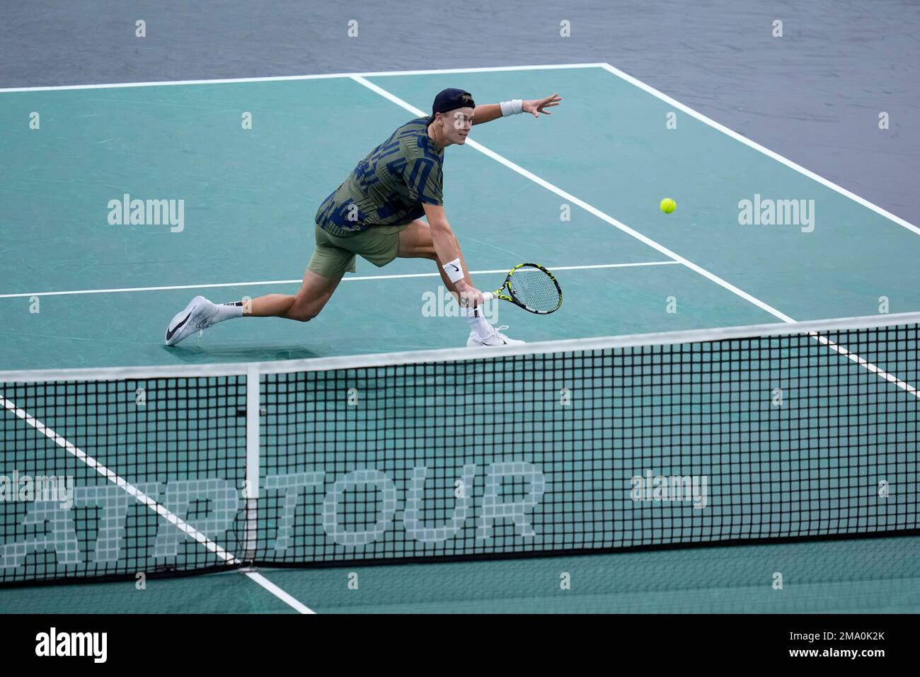 Denmark's Holger Rune backhands to Serbia's Novak Djokovic during their Paris Masters final at ...