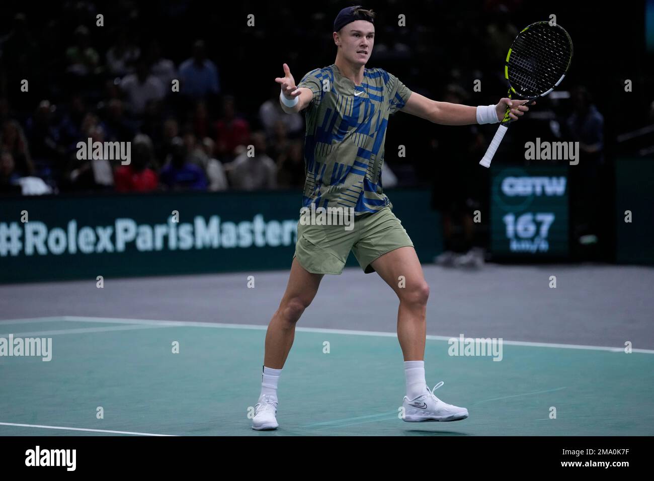 Denmark's Holger Rune reacts as he plays Serbia's Novak Djokovic during their Paris Masters ...
