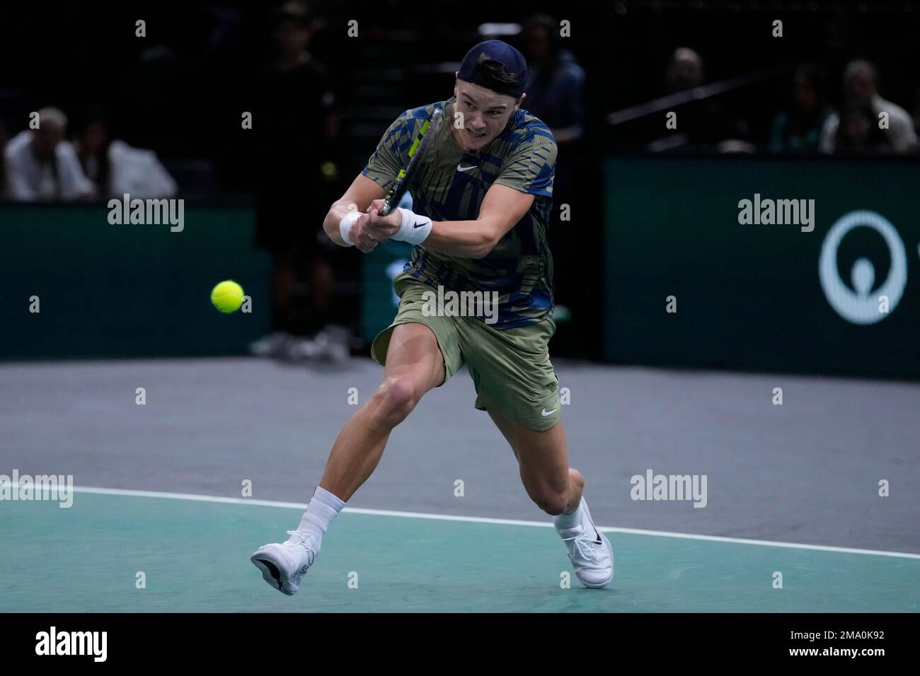 Denmark's Holger Rune backhands to Serbia's Novak Djokovic during their Paris Masters final at ...