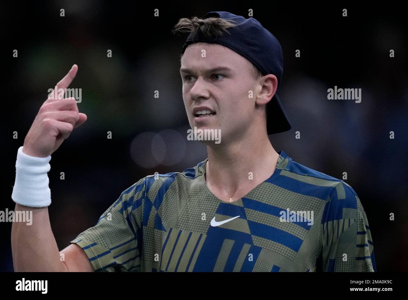 Denmark's Holger Rune reacts as he plays Serbia's Novak Djokovic during ...