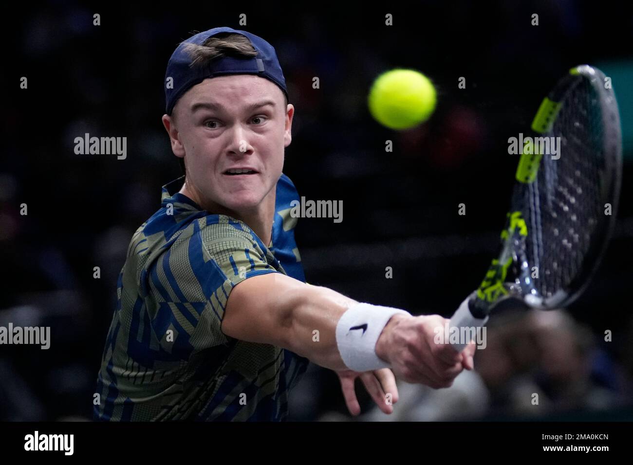 Denmark's Holger Rune returns the ball Serbia's Novak Djokovic during their Paris Masters final ...
