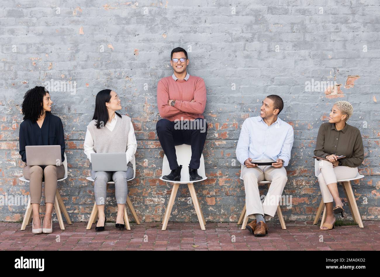 Creative business people, waiting room and man standing out against a ...