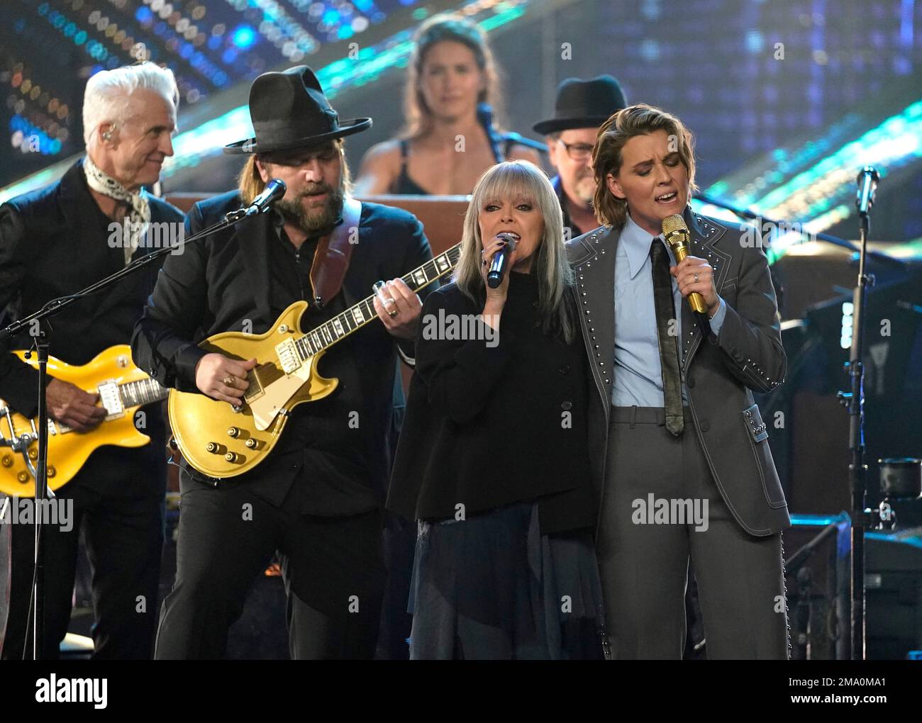 Inductee Pat Benatar, second from right, and Brandi Carlile, right ...