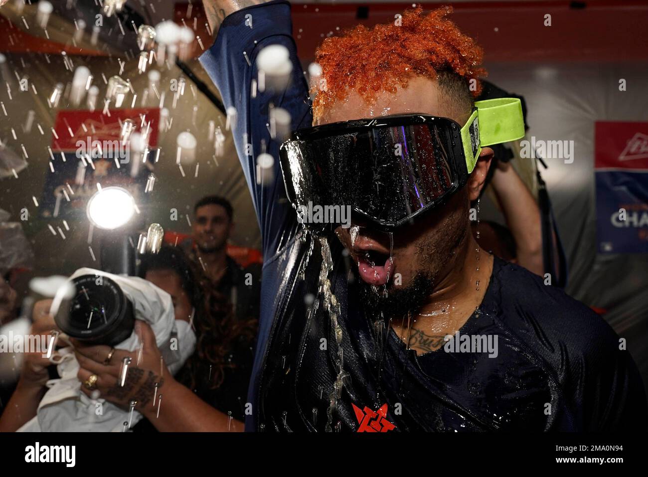 Houston Astros catcher Martin Maldonado celebrates in the locker room ...