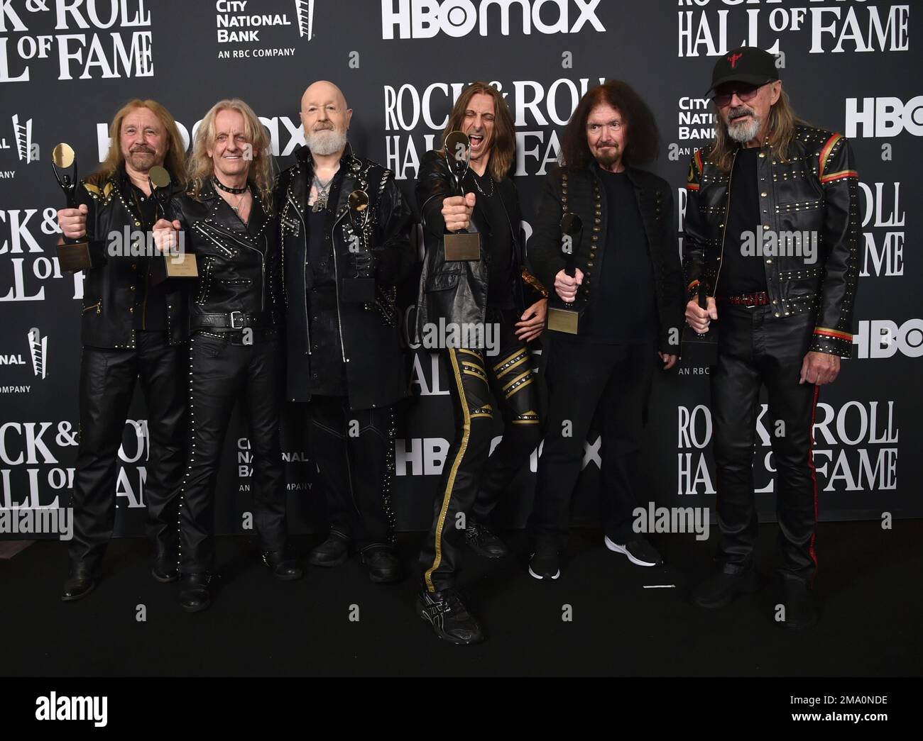 Inductees Ian Hill, from left, K. K. Downing, Rob Halford, Scott Travis ...