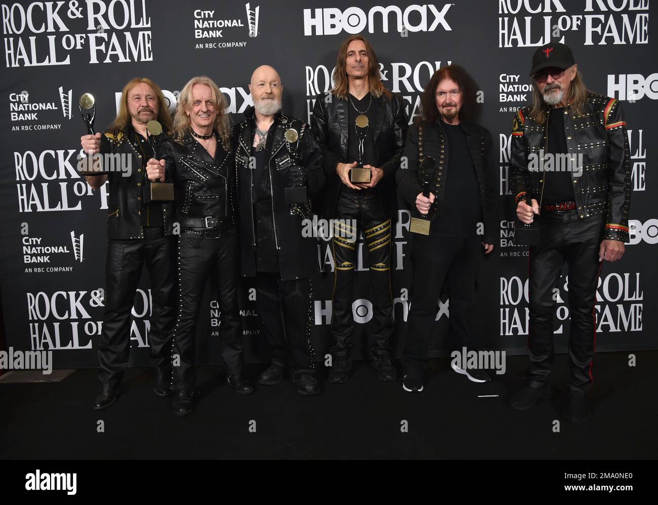 Inductees Ian Hill, from left, K. K. Downing, Rob Halford, Scott Travis ...