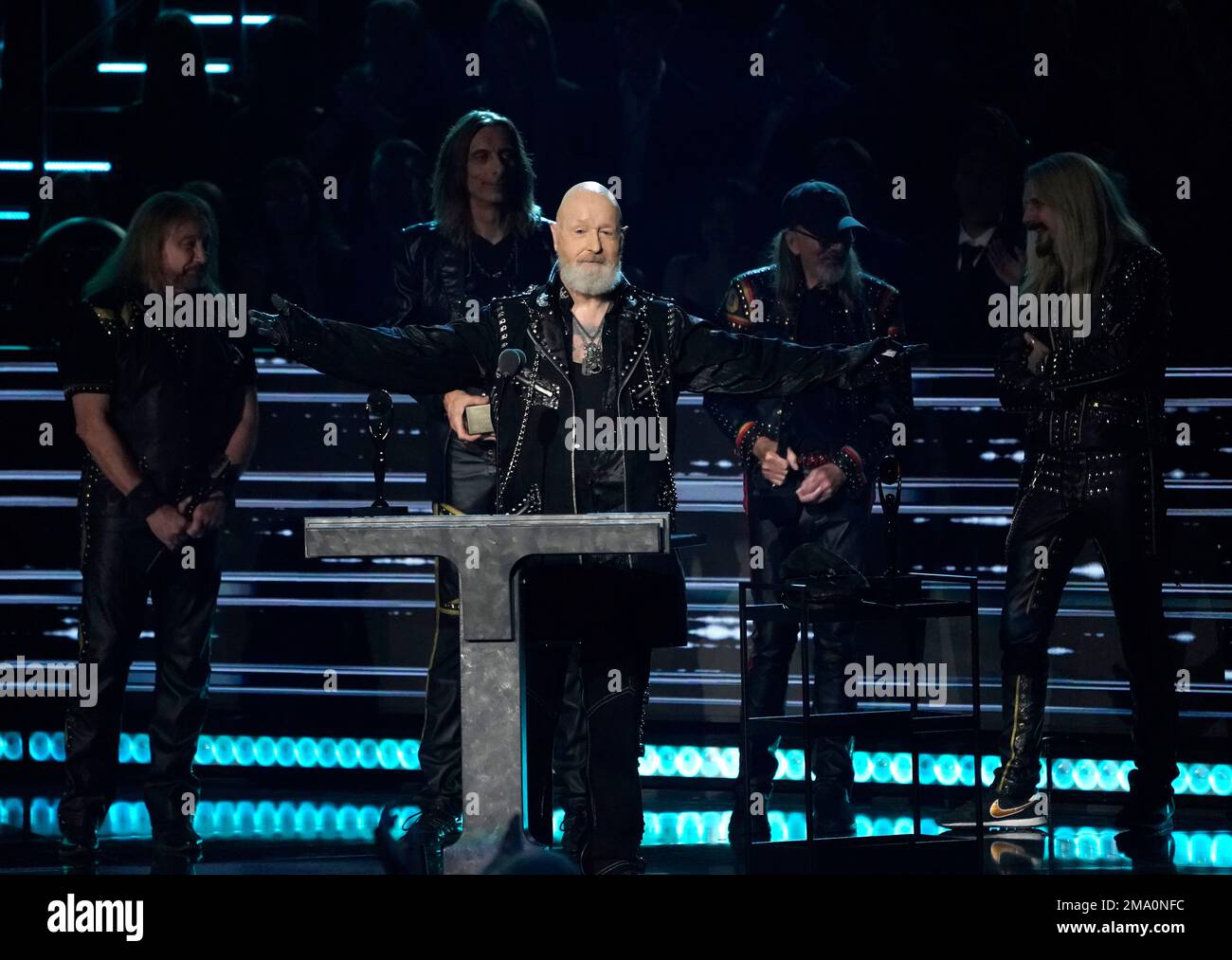 Inductees Ian Hill, from left, Scott Travis, Rob Halford, Glenn Tipton ...