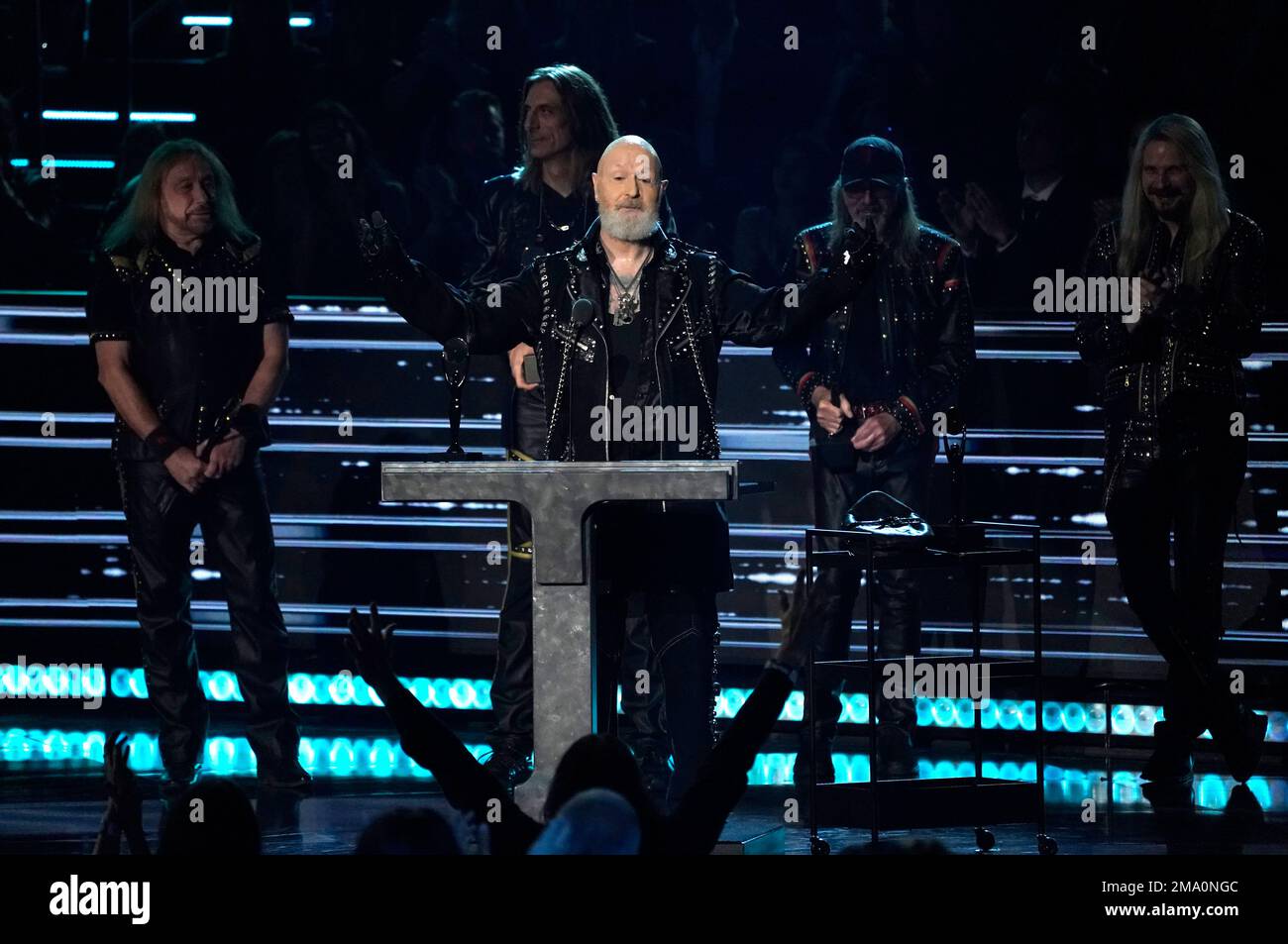 Inductees Ian Hill, from left, Scott Travis, Rob Halford, Glenn Tipton ...