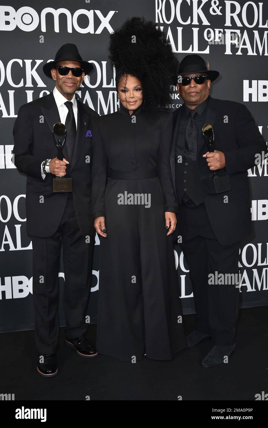 Janet Jackson, center, poses with inductees Jimmy Jam, left, and Terry Lewis in the press room ...