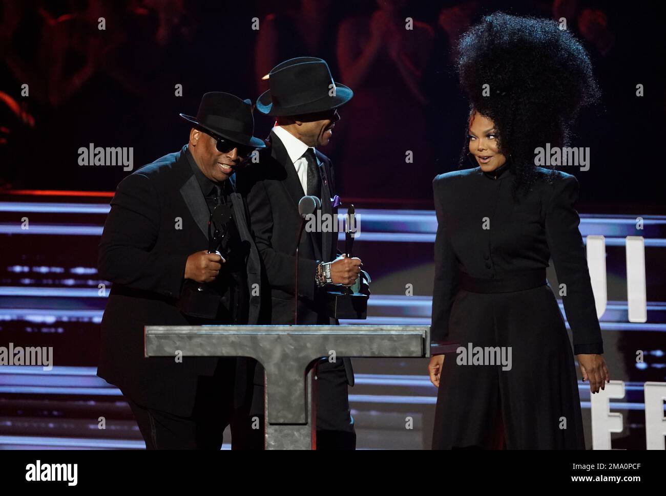 Janet Jackson, right, introduces inductees Terry Lewis, left, and Jimmy Jam during the Rock ...