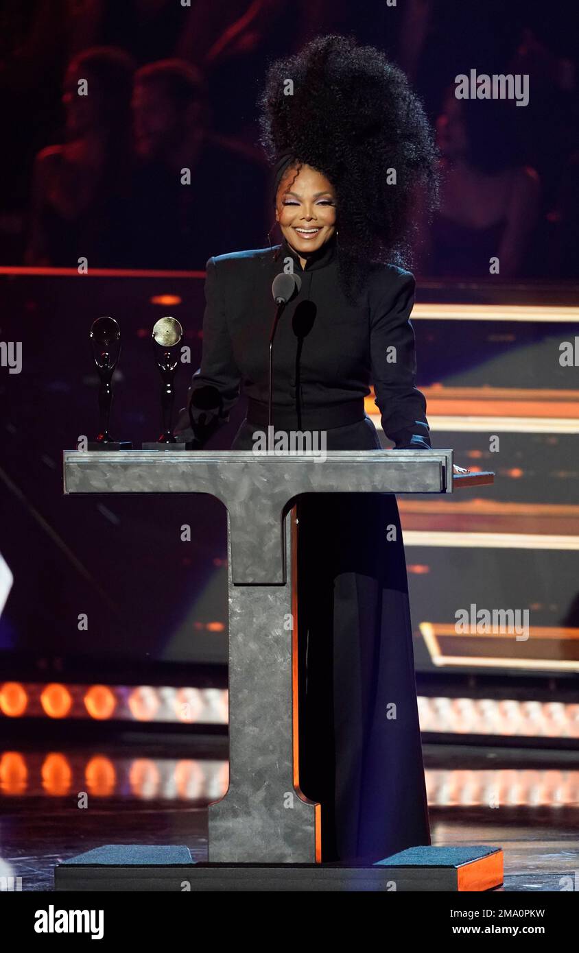 Janet Jackson introduces inductees Jimmy Jam and Terry Lewis during the ...