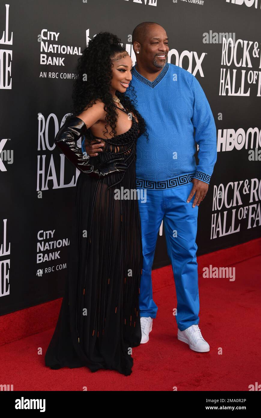 LeA Robinson, left, and Leland Robinson Jr. arrive at the Rock & Roll ...