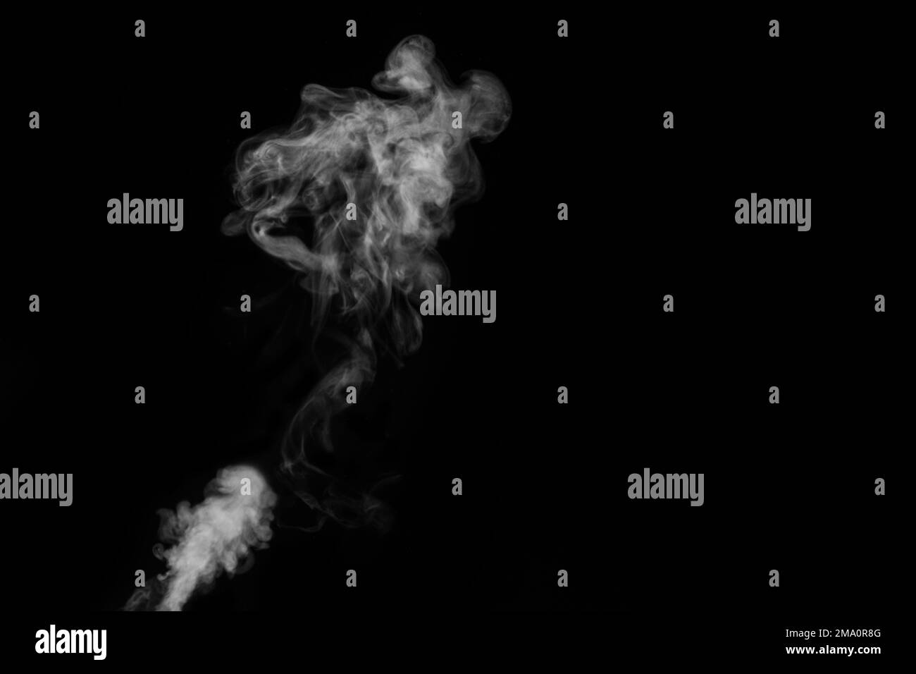 Close-up view of white water vapor with spray from the humidifier ...