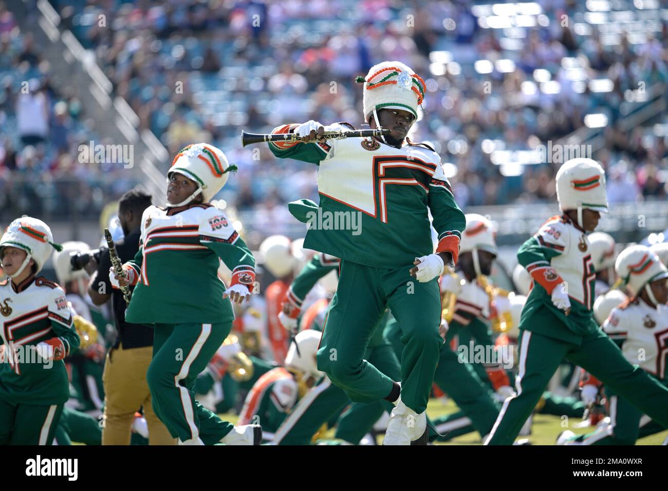 Members of the Florida A&M University marching band perform during ...