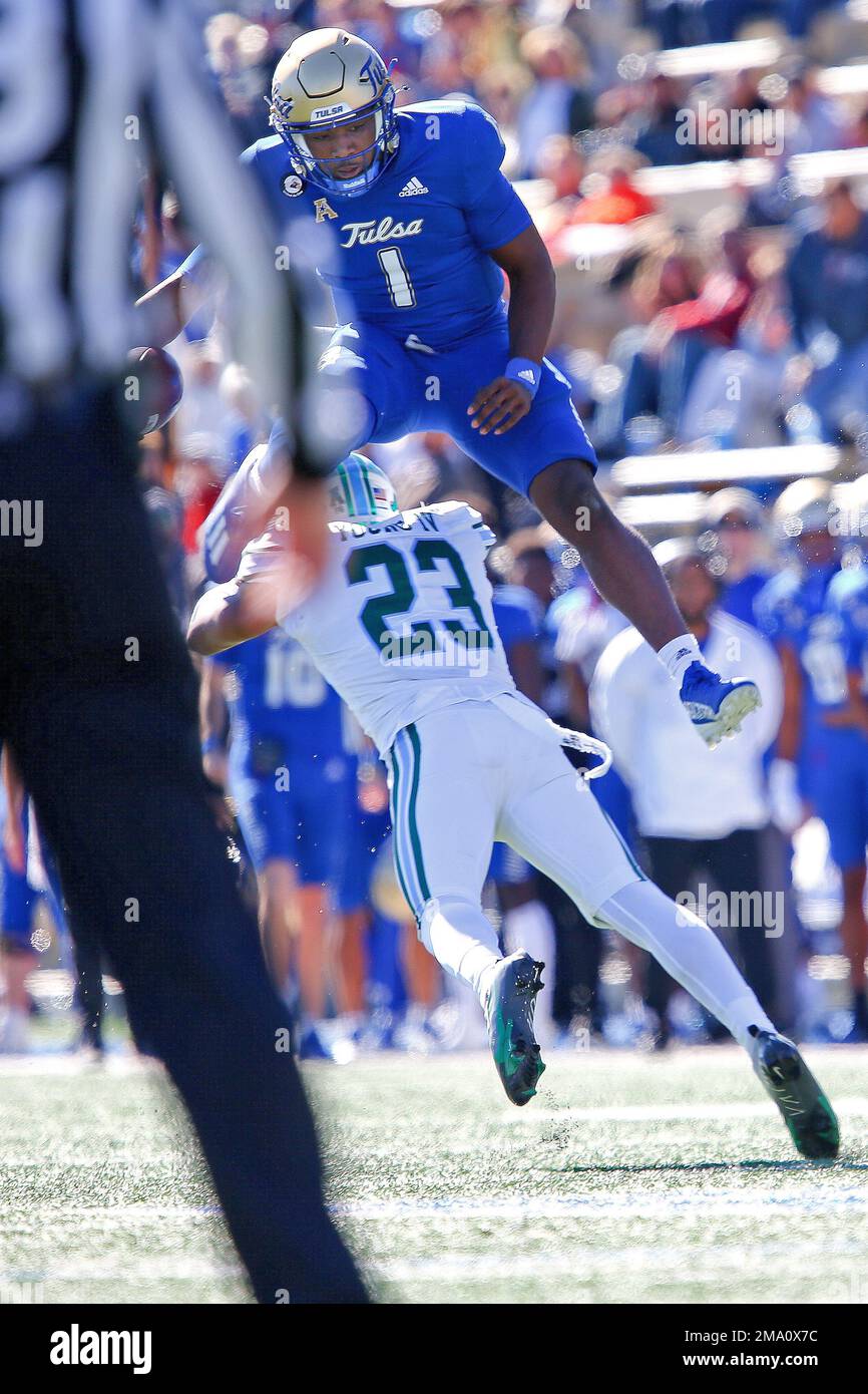 Tulsa quarterback Braylon Braxton jumps high over Tulane defender ...