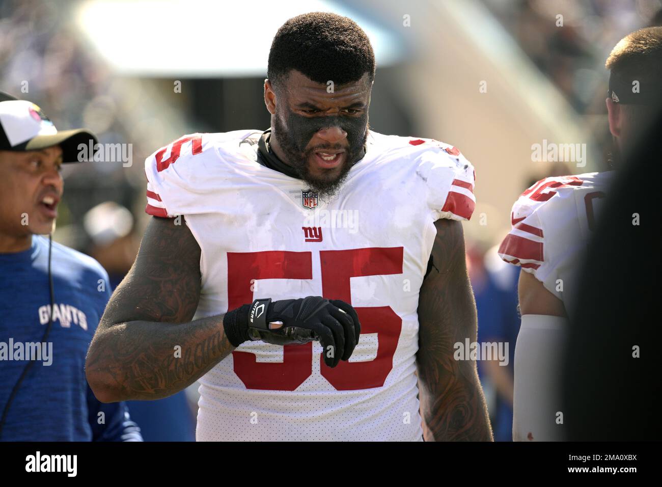 New York Giants linebacker Jihad Ward (55) talks with teammates on the ...