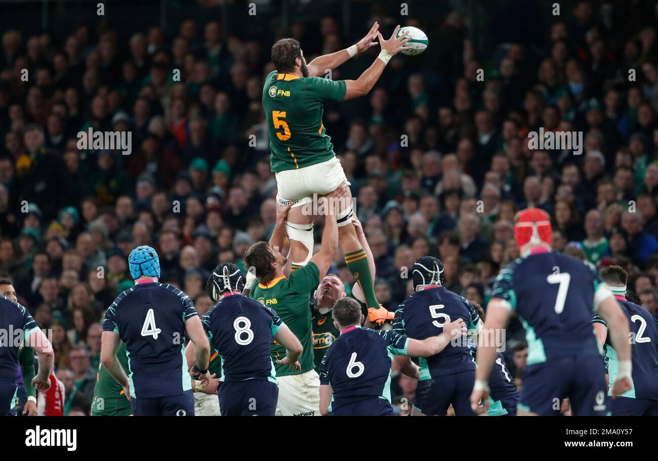South Africa's Lood De Jager, top, jumps for the ball during a line out ...