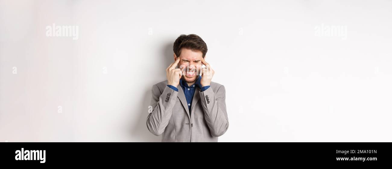 Image of frustrated man trying to think, cant remember something ...