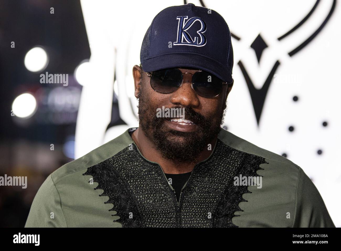 Dereck Chisora poses for photographers upon arrival for the premiere of ...