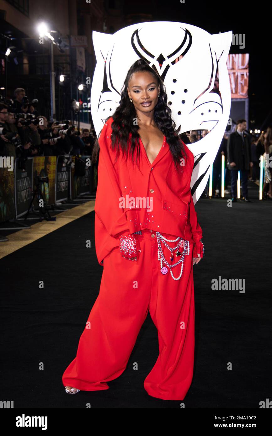 Imani-Lara Lansiquot poses for photographers upon arrival for the ...
