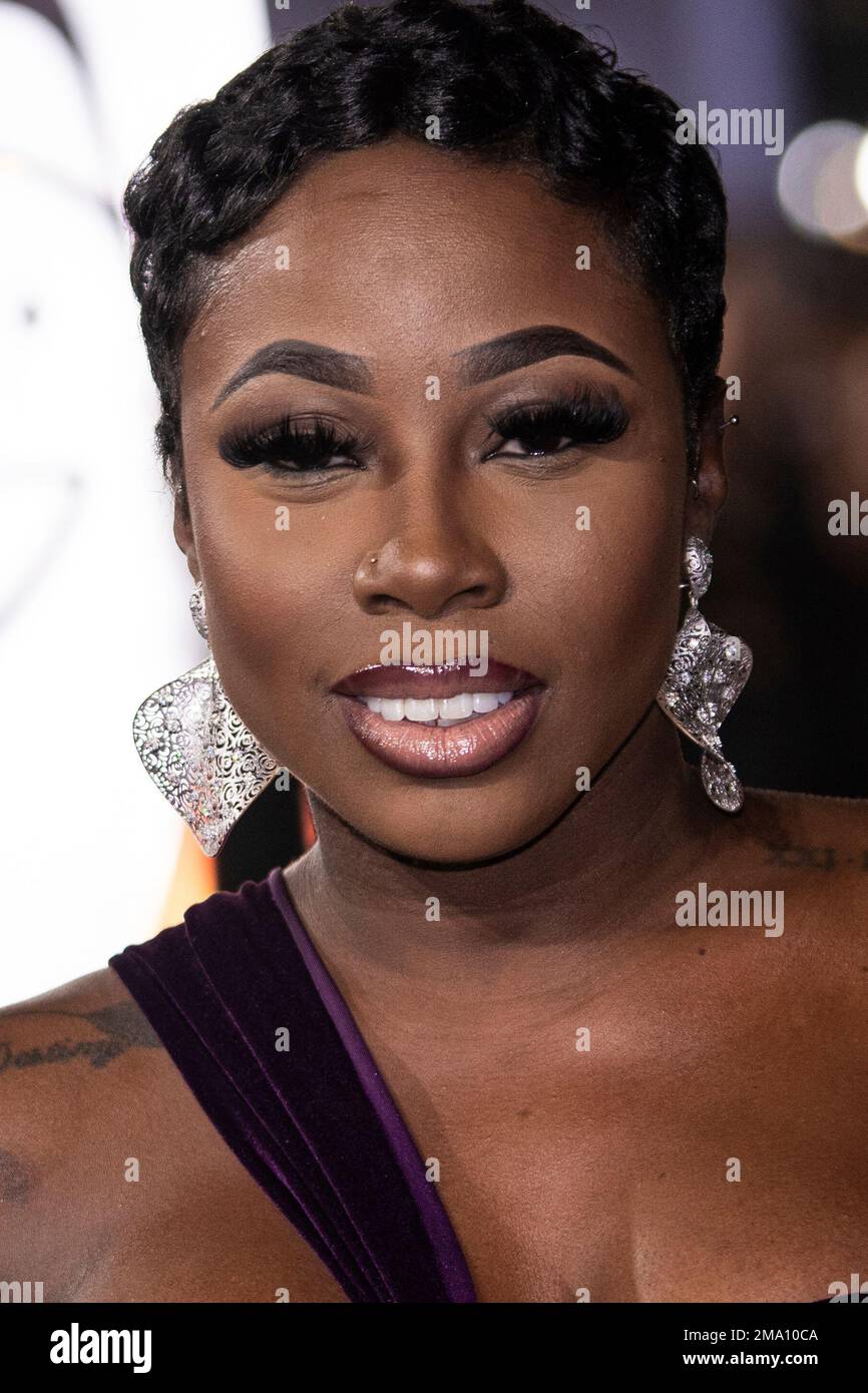 Esther Falana poses for photographers upon arrival for the premiere of ...